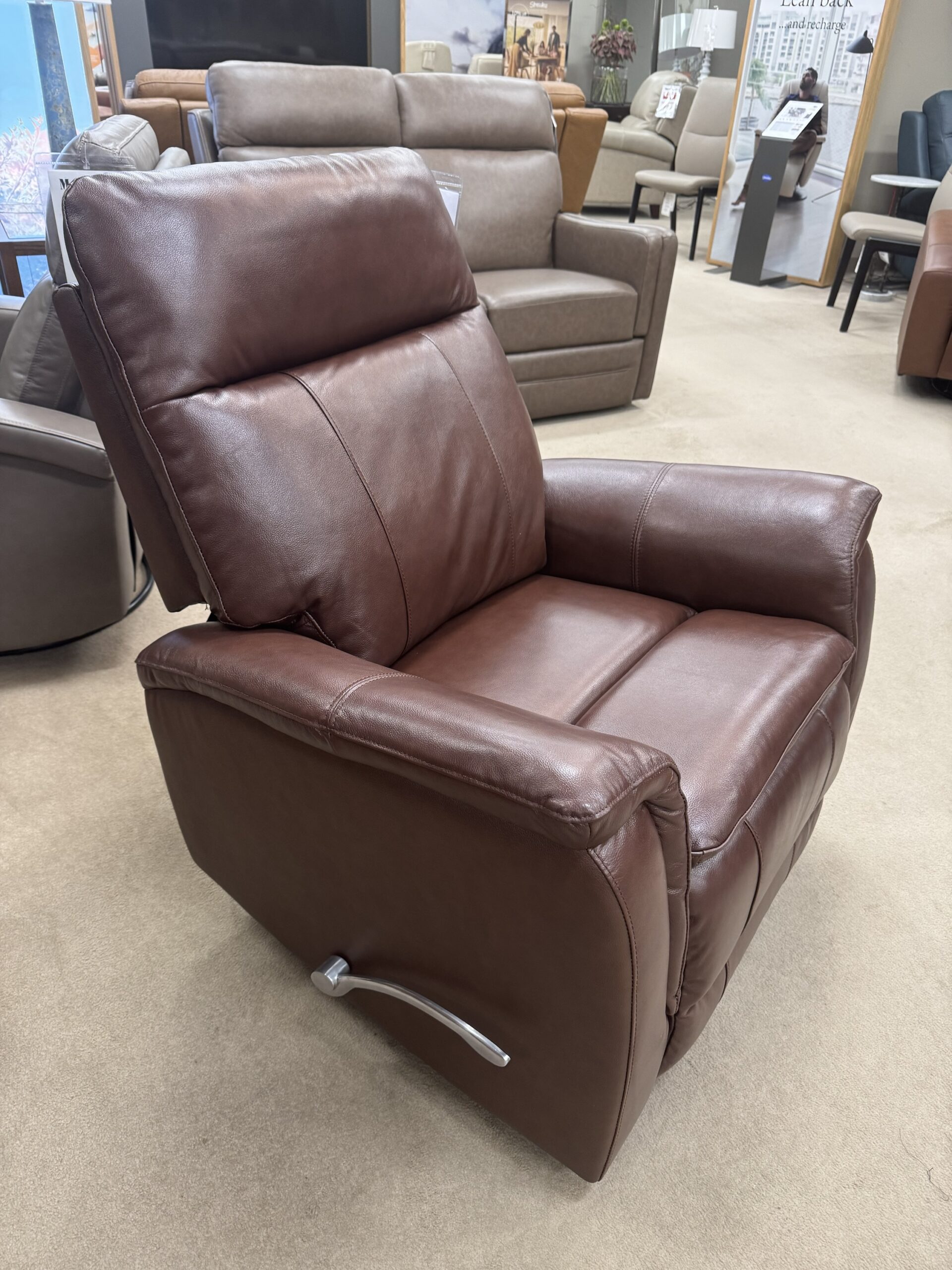 Man Wah Leather Swivel Glider Recliner – Marty Rae's - Lexington SC ...